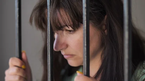 Woman On One Bar Prison Stock Videos – Royalty-Free HD & 4K Videos