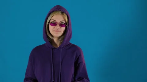 Girl with bewildered look on face pointi... | Stock Video | Pond5