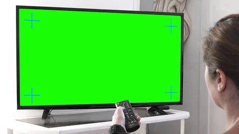Girl Channel Surfing Tv Zoom In Green Sc... | Stock Video | Pond5