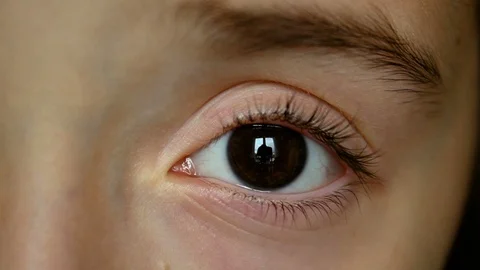 Girl child eye, dark brown left eye clos... | Stock Video | Pond5