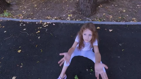 Girl child take care of tree sprout. | Stock Video | Pond5