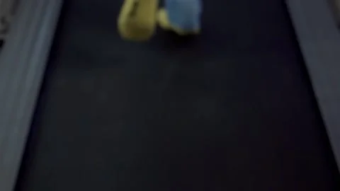 A girl child in yellow socks and jeans w... | Stock Video | Pond5