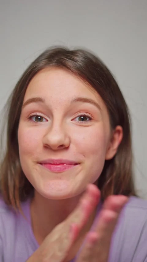 girl clapping her hands with joy and exc... | Stock Video | Pond5