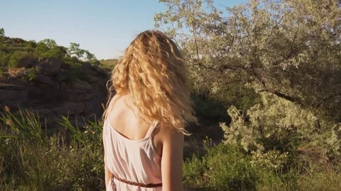 girl dancer is spinning, her curls fall ... | Stock Video | Pond5