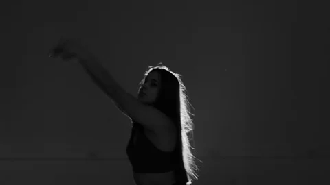 girl dancing modern dance on gray backgr... | Stock Video | Pond5