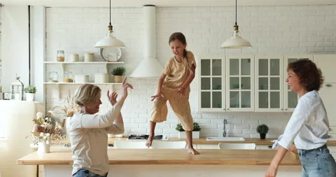 Girl dancing on table having fun with mo... | Stock Video | Pond5