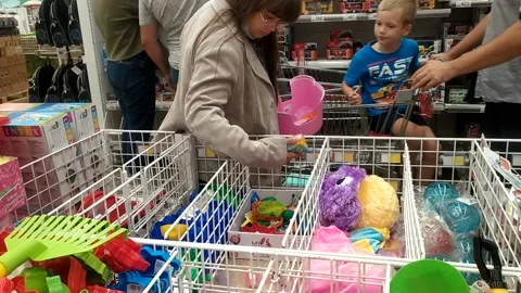 girl in the department of goods for chil... | Stock Video | Pond5