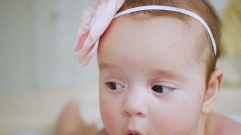 girl in a diaper without clothes | Stock Video | Pond5