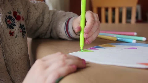 Girl Drawing On Paper At Table, Little G... | Stock Video | Pond5
