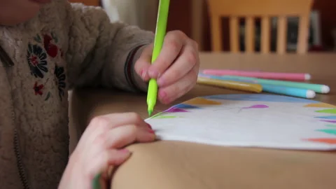 Girl Drawing On Paper At Table, Little G... | Stock Video | Pond5