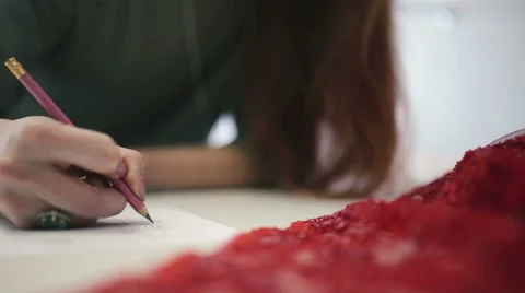 The girl draws pencil sketch on paper. C... | Stock Video | Pond5