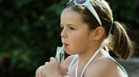 girl drinking a soda pop | Stock Video | Pond5