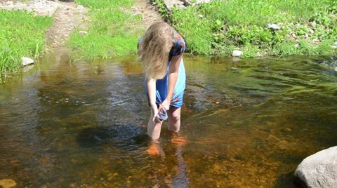 girl dry down dresses wet | Stock Video | Pond5