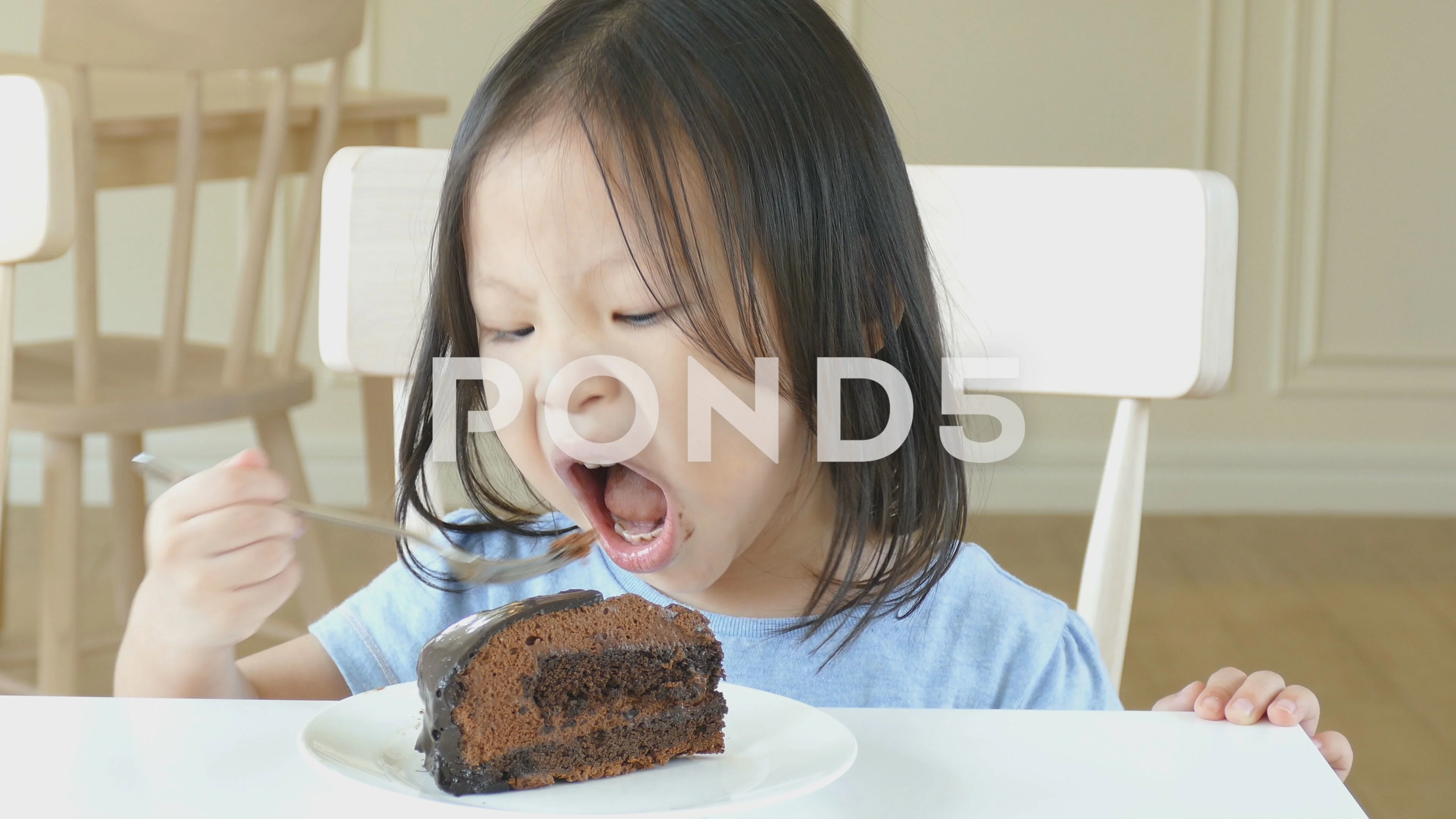 Kid Eating Chocolate Cake