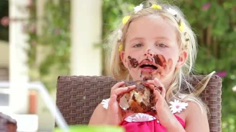 Girl Eating Messy Slice Of Chocolate Cak... | Stock Video | Pond5