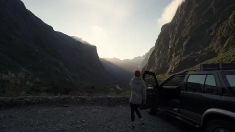 Girl getting out of her four wheel drive... | Stock Video | Pond5