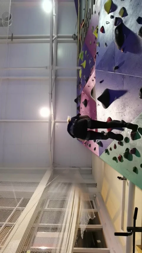 the girl is going down the rope. bottom ... | Stock Video | Pond5