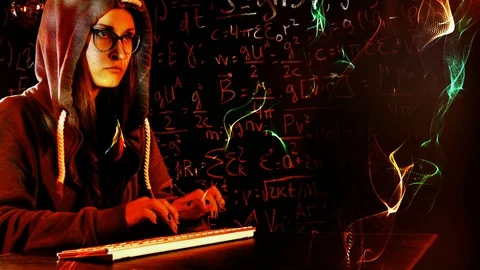 Girl Hacker wearing grey hoodie with mat... | Stock Video | Pond5