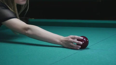 girl hand puts ball on the billiard tabl... | Stock Video | Pond5