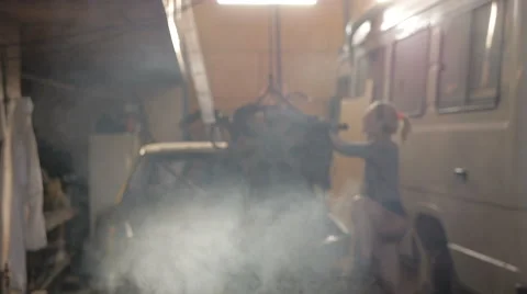 Girl in jeans rummaging in the naked eng... | Stock Video | Pond5