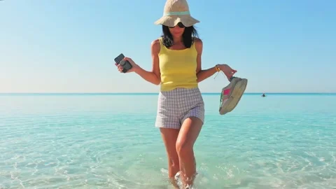 Girl legs walking on water waves Slim fe... | Stock Video | Pond5