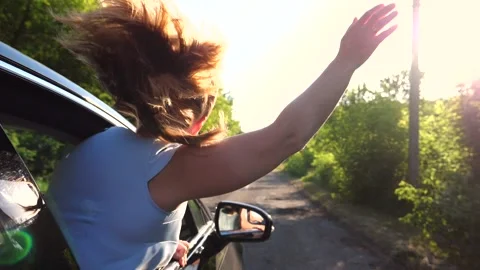 Girl looking out from window of moving a... | Stock Video | Pond5