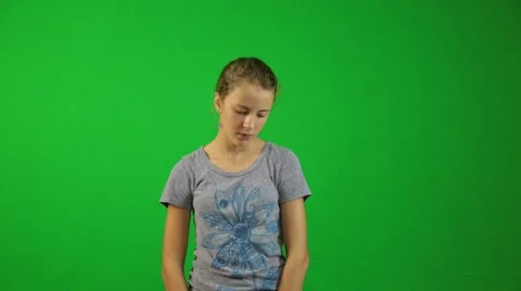 Girl looking sad. Green screen | Stock Video | Pond5