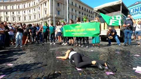 girl lying on the ground during protest ... | Stock Video | Pond5