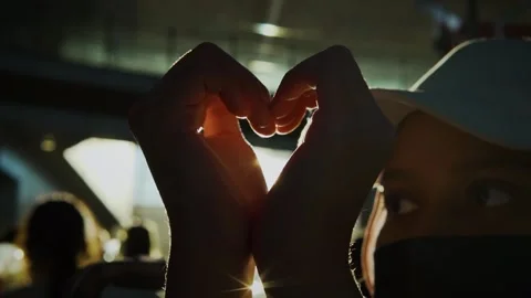 girl making heart shape hands, heart han... | Stock Video | Pond5