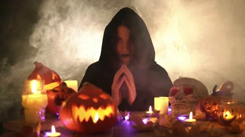 Girl in mantle with hands together raise... | Stock Video | Pond5