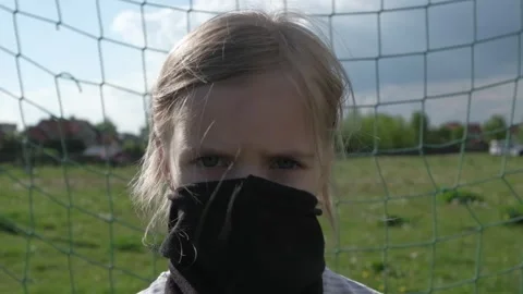 A girl with menacing look in black prote... | Stock Video | Pond5