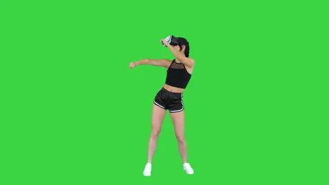 Girl playing virtual reality dancing gam... | Stock Video | Pond5