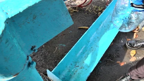 The girl pours drinking water from hydra... | Stock Video | Pond5