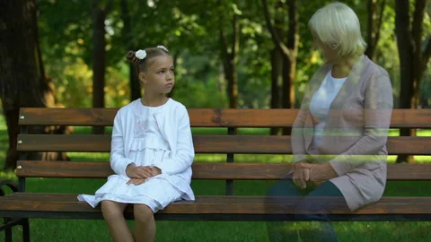 Girl remembering her grandmother, sittin... | Stock Video | Pond5