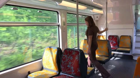 girl Riding the train there is no one Sh... | Stock Video | Pond5