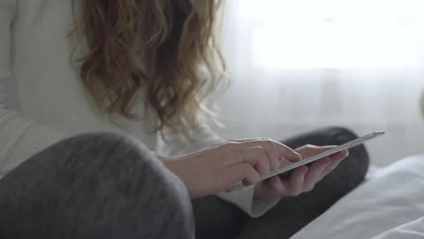 Girl Scrolling Through Social Media in B... | Stock Video | Pond5