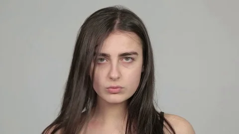 Girl shows different facial expressions ... | Stock Video | Pond5