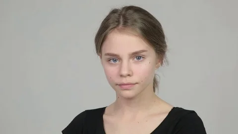 Girl shows different facial expressions ... | Stock Video | Pond5