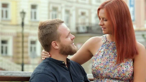 Girl sitting on the lap the guy | Stock Video | Pond5