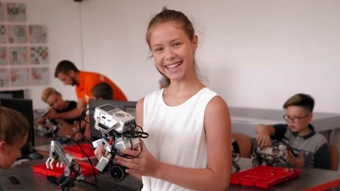 A girl student in the robotics office at... | Stock Video | Pond5
