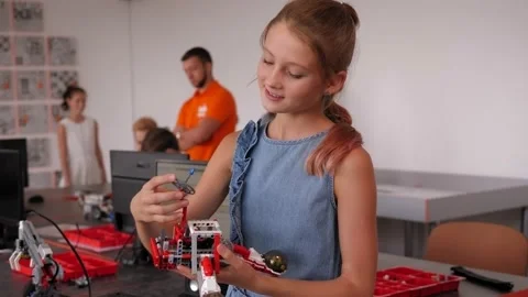 A girl student in the robotics office at... | Stock Video | Pond5