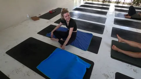 A girl taking a yoga class in Pai, Thail... | Stock Video | Pond5