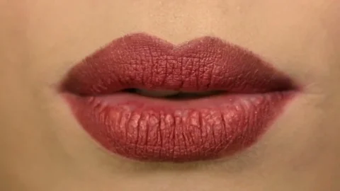 Girl talking in the camera, lips closeup | Stock Video | Pond5