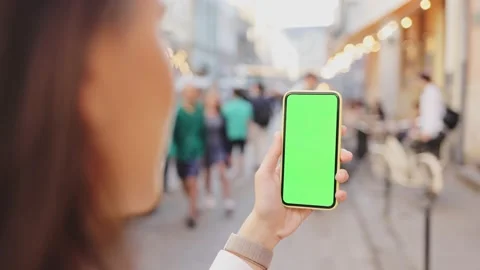 Girl using phone green screen outdoors. ... | Stock Video | Pond5