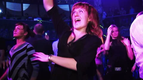 Girl is very scary and bad dancing at a ... | Stock Video | Pond5