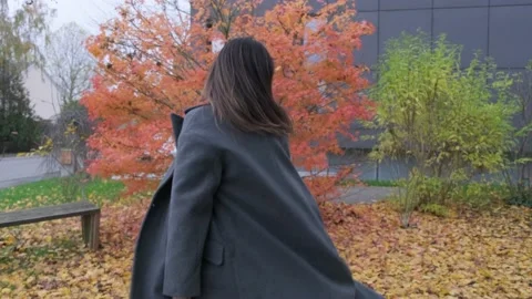 Girl walking and dancing at fall season ... | Stock Video | Pond5