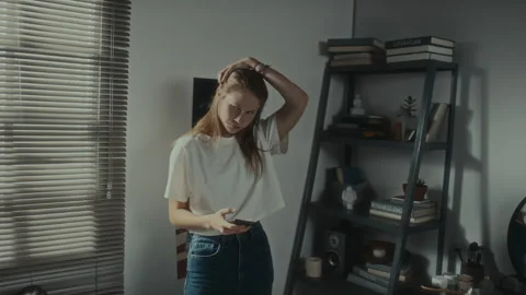 Girl Walking Nervously in Bedroom and Us... | Stock Video | Pond5