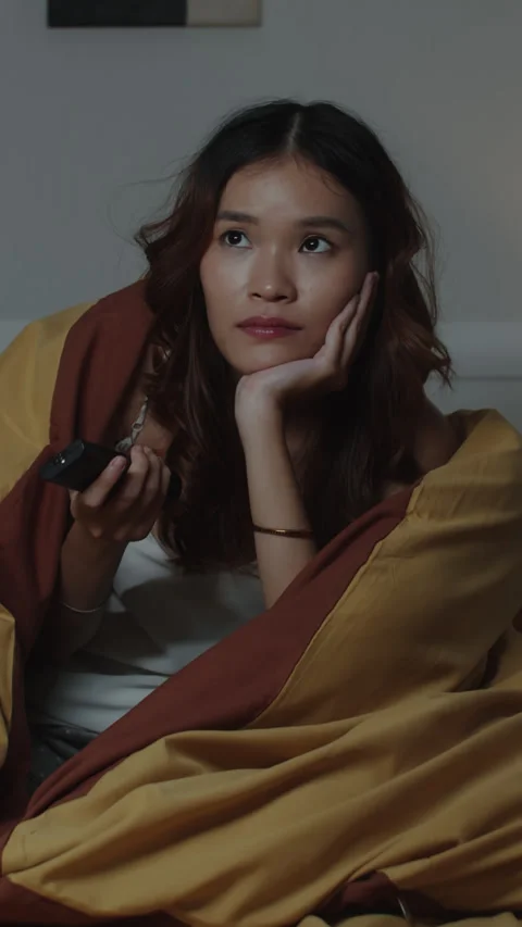 Girl Watching Soap Opera in Bed at Night | Stock Video | Pond5