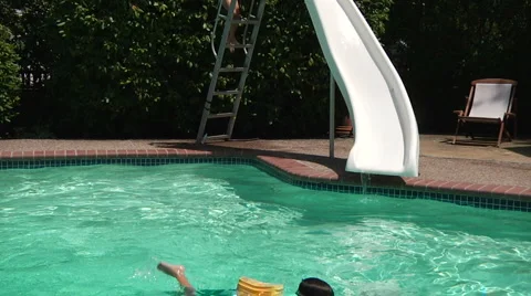 Girl Going Down Waterslide Stock Footage ~ Royalty Free Stock Videos ...