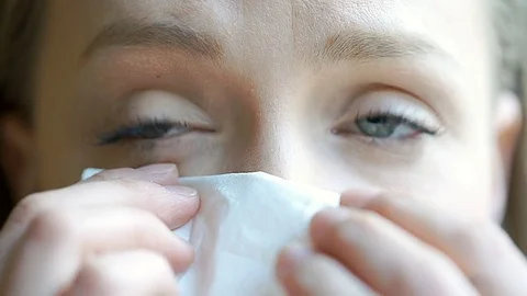 Girl wiping tears while crying and looki... | Stock Video | Pond5